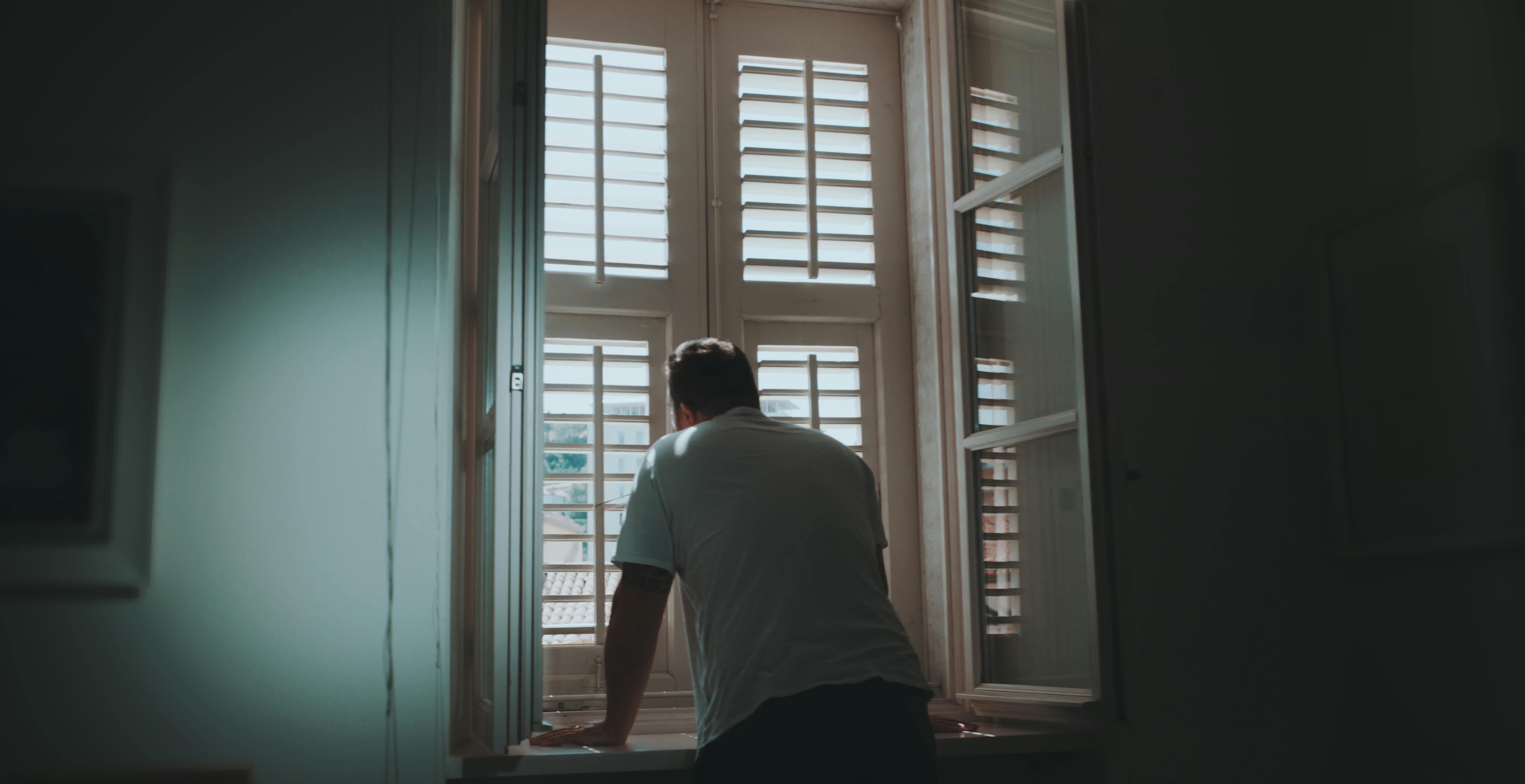 Discover man-looking-through-the-window, a story-driven footage | Artlist
