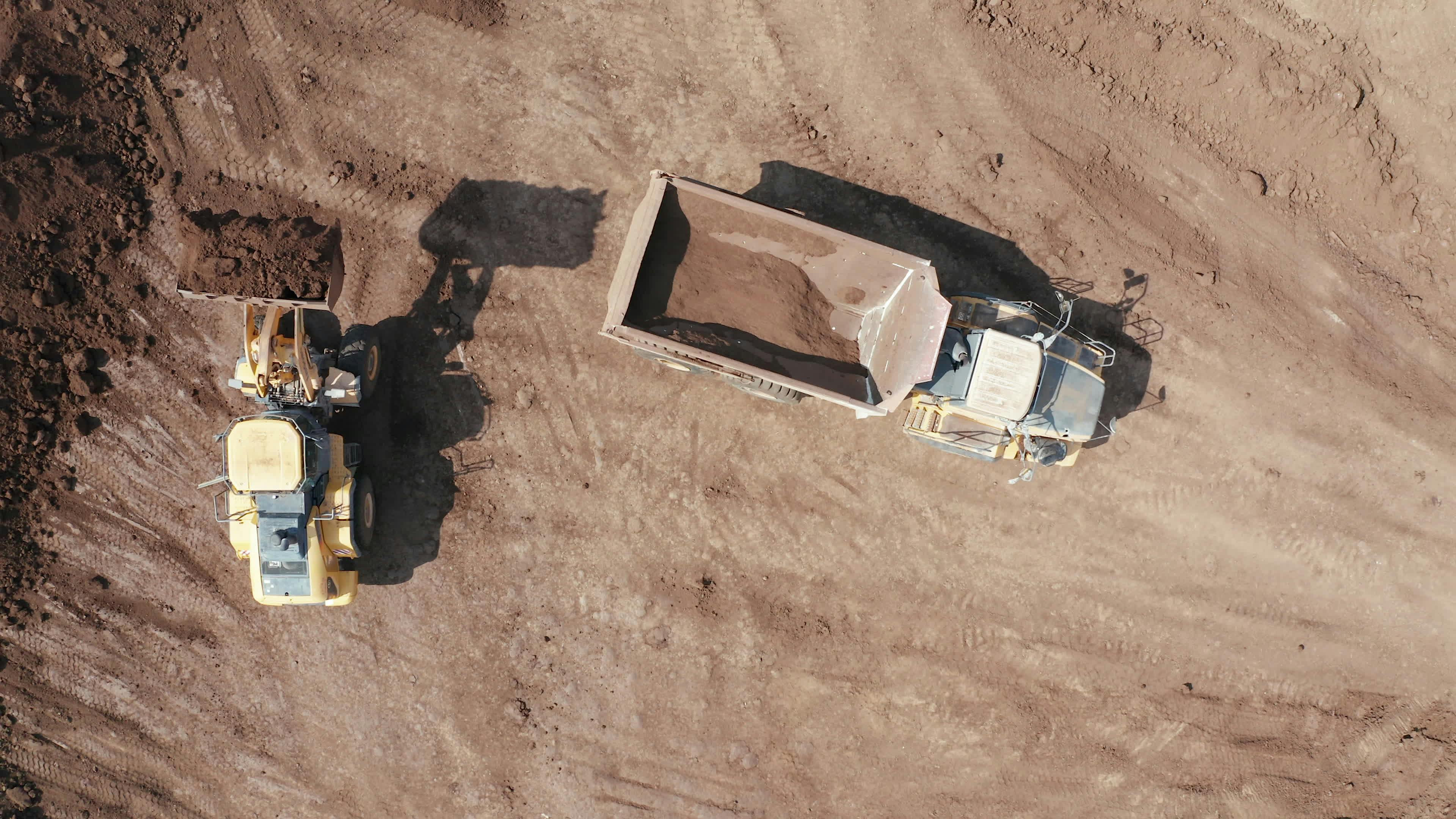 Discover earthmoving-machinery-in-excavation-site, a story-driven footage